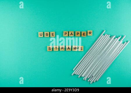 The word help is laid out from domino letters on an old wooden table ...