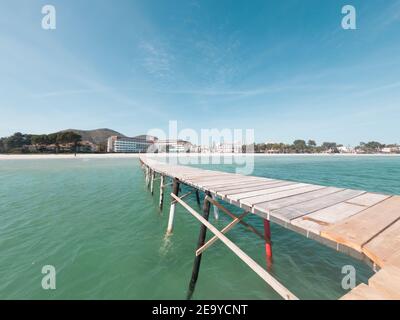 A pontoon bridge, on a sunny day, wiith blue water aorund in Mallorca ...
