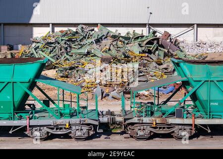 Scrap metal recycling loading train wagons with processed metals, EMR ...