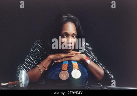 French fencer Laura Flessel-Colovic with 5 Olympics medals, 2 gold ...