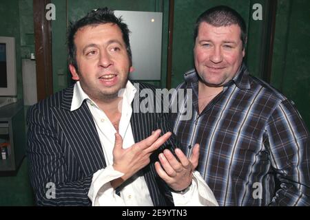 French humorist, movie director and cast member Michel Muller (L) with cast member Pierre-Ange ...