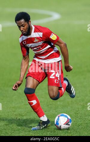 Cameron John of Doncaster Rovers in action with Sunderland's Josh ...