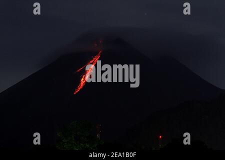 Yogyakarta, Indonesia. 06th Feb, 2021. A Indonesian Muslims help ...