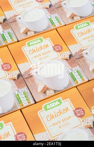 Neatly aligned ASDA own-label chicken soup in card boxes. For UK ...