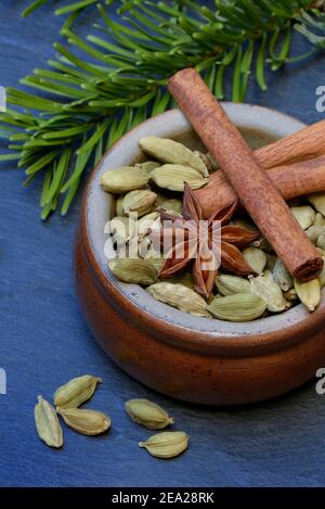 Star anise with cinnamon. Christmas spices on rustic wooden background ...