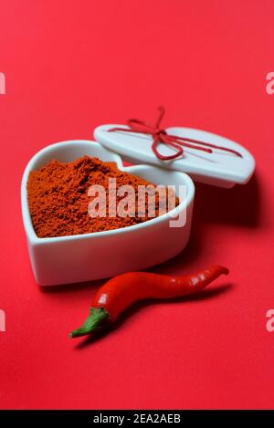Paprika powder and heart, chili, chili powder ( Capsicum annuum Stock ...