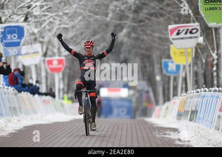 Belgian Laurens Sweeck celebrates as he crosses the finish line to win ...