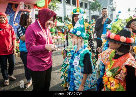 Tri Rismaharini, known as Bu Risma, addresses a crowd at a schools ...