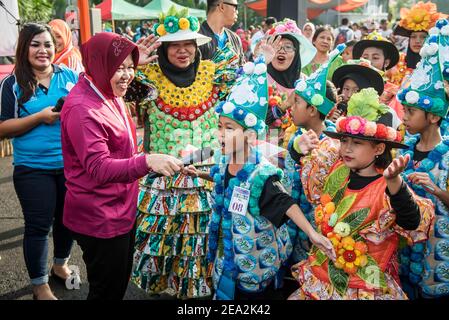 Tri Rismaharini, known as Bu Risma, addresses a crowd at a schools ...