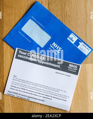 NHS Scotland blue envelope and vaccine appointment letter during Covid ...