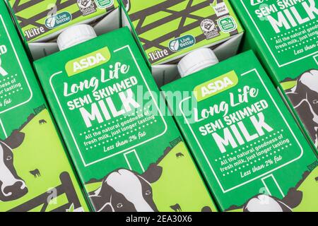 Close shot of paper cartons of ASDA own-label long-life UHT semi ...