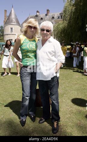 French musician Marc Cerrone and his wife Jill attend the opening of ...