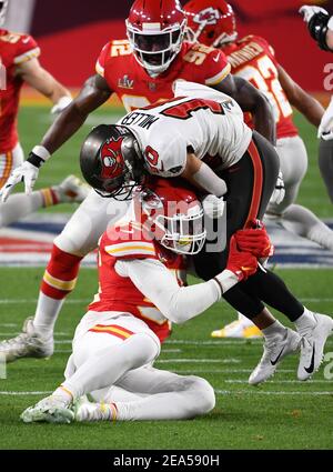 Kansas City Chiefs Frank Clark, left, and Patrick Mahomes celebrate ...