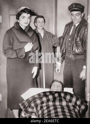 President Kennedy and Jackie leaving hospital with baby Stock Photo - Alamy