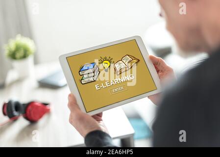 Tablet screen displaying an e-learning concept Stock Photo - Alamy