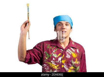 Young painter artist pointing upwards Stock Photo - Alamy