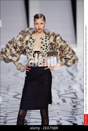 A model wears a creation for the Valentino ready-to-wear Spring/Summer ...