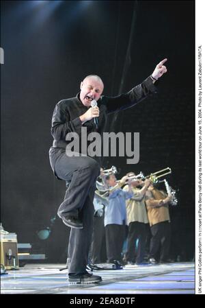 UK singer Phil Collins performs in concert at Paris Bercy hall during ...