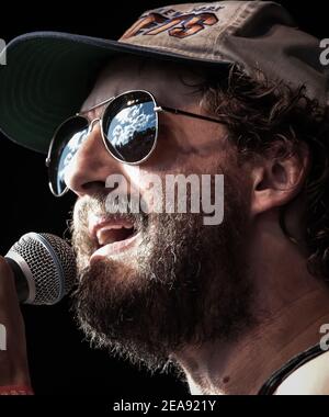 Matthew Houck of Phosphorescent performing live on stage as part of the ...