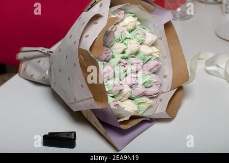 Zephyr bouquet. Marshmallow tulips are collected in a bouquet and ...