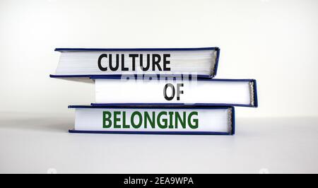 Culture of belonging symbol. Books with words 'culture of belonging' on ...