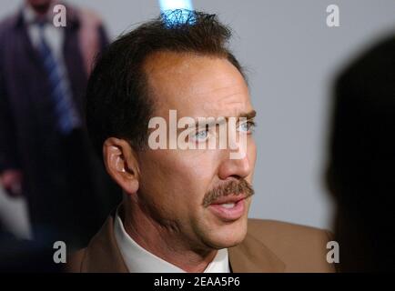 Nicolas Cage arrives for the premiere of his new movie "The Weatherman ...