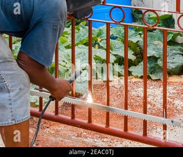 Installation of metal gates Stock Photo - Alamy