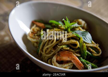 Pesto Spaghetti with shimp in high contrast italian food Stock Photo ...