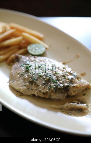 Coalfish Filet with Chips Stock Photo - Alamy