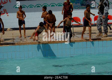 New Pool Opening in Baghdad Stock Photo - Alamy