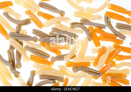 Pile of multi-colored pasta isolated on white background. Studio Photo ...