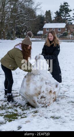 Brentwood Essex 9th February 2021 Weather: Storm Darcy. Postman returns ...