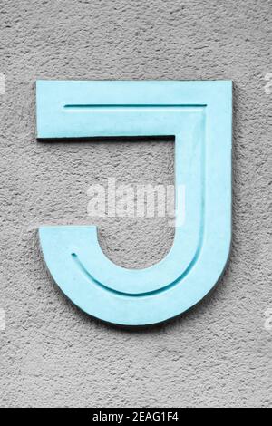 Alphabet letter R on gray stucco texture Stock Photo - Alamy