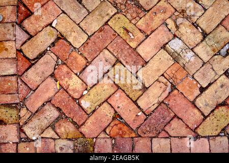 Bricks in Herringbone pattern in Key West, Florida, FL USA. Aged ...