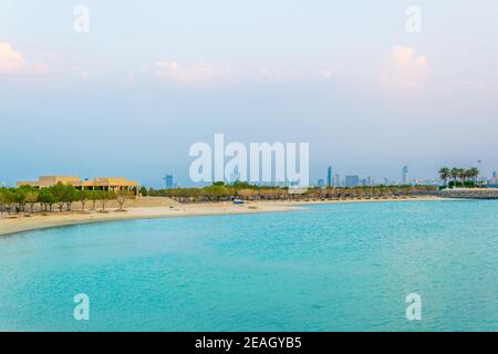 Skyline of Kuwait during sunset Stock Photo - Alamy
