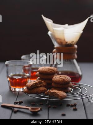 Chemex with hot coffee and cookies on table Stock Photo - Alamy