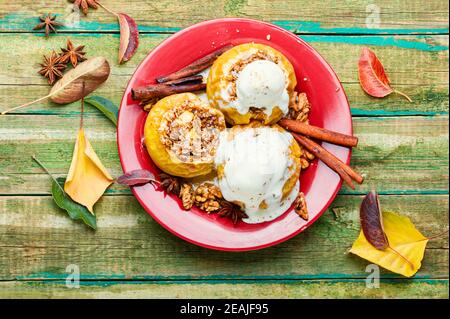 Appetizing baked apple with granola, cinnamon, nuts and honey. Healthy ...
