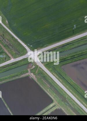 Crossroads paved roads through the fields. View from above Stock Photo ...