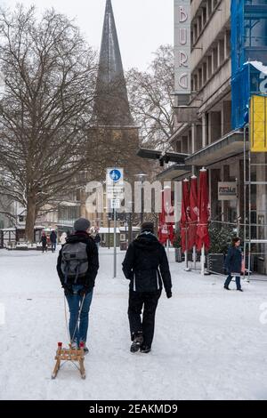 Inner city of Essen, onset of winter, lots of fresh snow and daytime ...