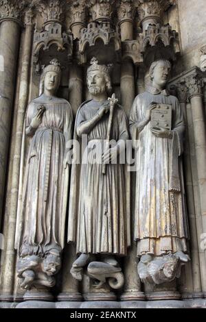 Medieval statues on entry in catholic church Petit Sablon in Brussels ...