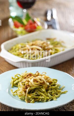 bavarian spinach spaetzle on wood Stock Photo - Alamy