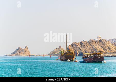 Oman Muscat Dhow Bay promenade gaze Mutrha fort sultanate city capital ...