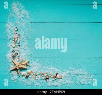 White frame with starfish on blue background and seashells. Creative ...