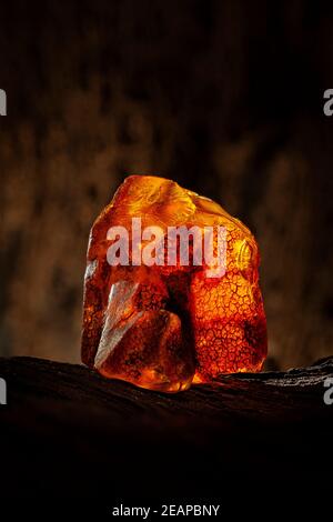 A piece of yellow semi opaque natural amber, classification color ...