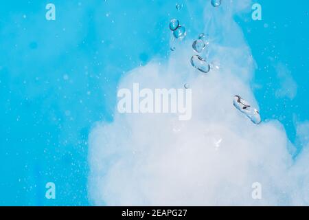 Water drop. Chemical reaction with boiling swirling water splashes ...