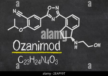 Blackboard with the chemical formula of Ozanimod Stock Photo - Alamy