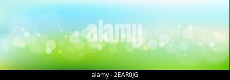 Multicolored blurry bokeh on a green background Stock Photo - Alamy