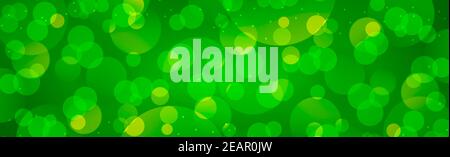 Multicolored blurry bokeh on a green background Stock Photo - Alamy