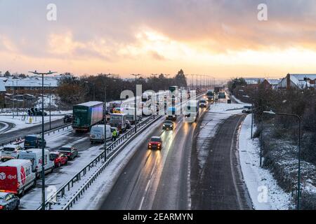 Traffic jam on two lanes after snow had fallen on a British dual ...