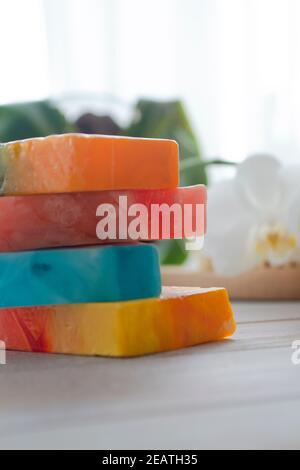 Closeup of handmade soap bars on a wooden surface on the table Stock ...